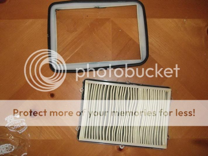 Next I had to remove the outermost trim off the K&N filter with a razor ...